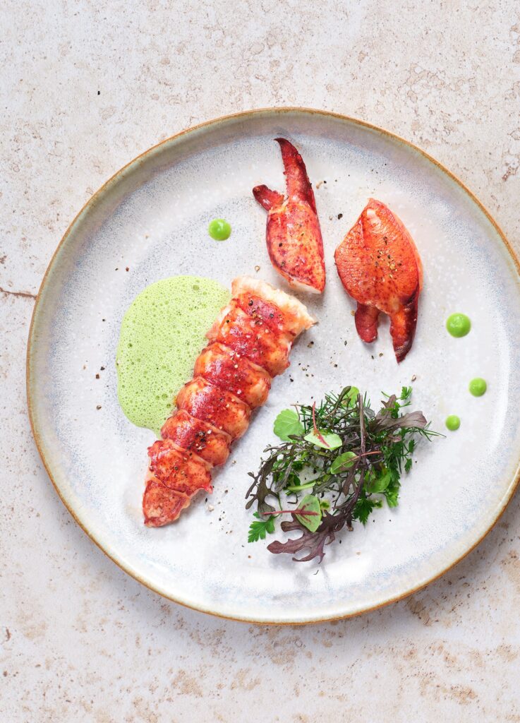 Lobster tail and claws, peas and mesclun salad - Rougié